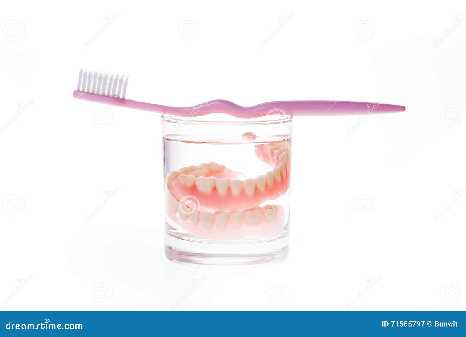 Dentures in Glass of Water and Toothbrush Stock Image - Image of ...