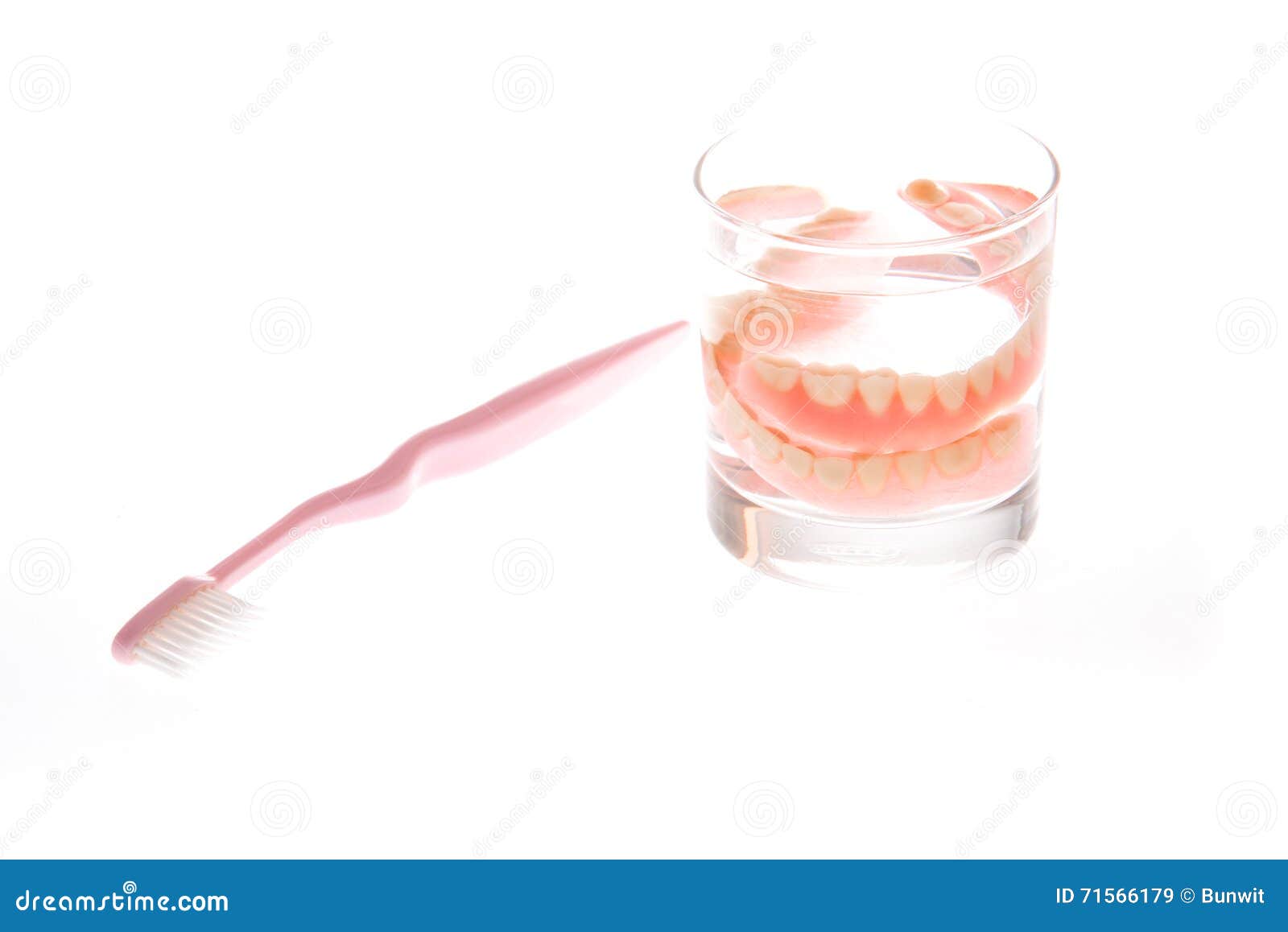 Dentures in Glass of Water and Toothbrush Stock Image - Image of glass ...