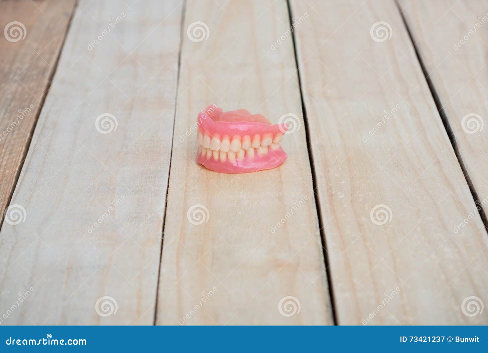 Dentures on wooden table stock image. Image of view, orthodontist ...