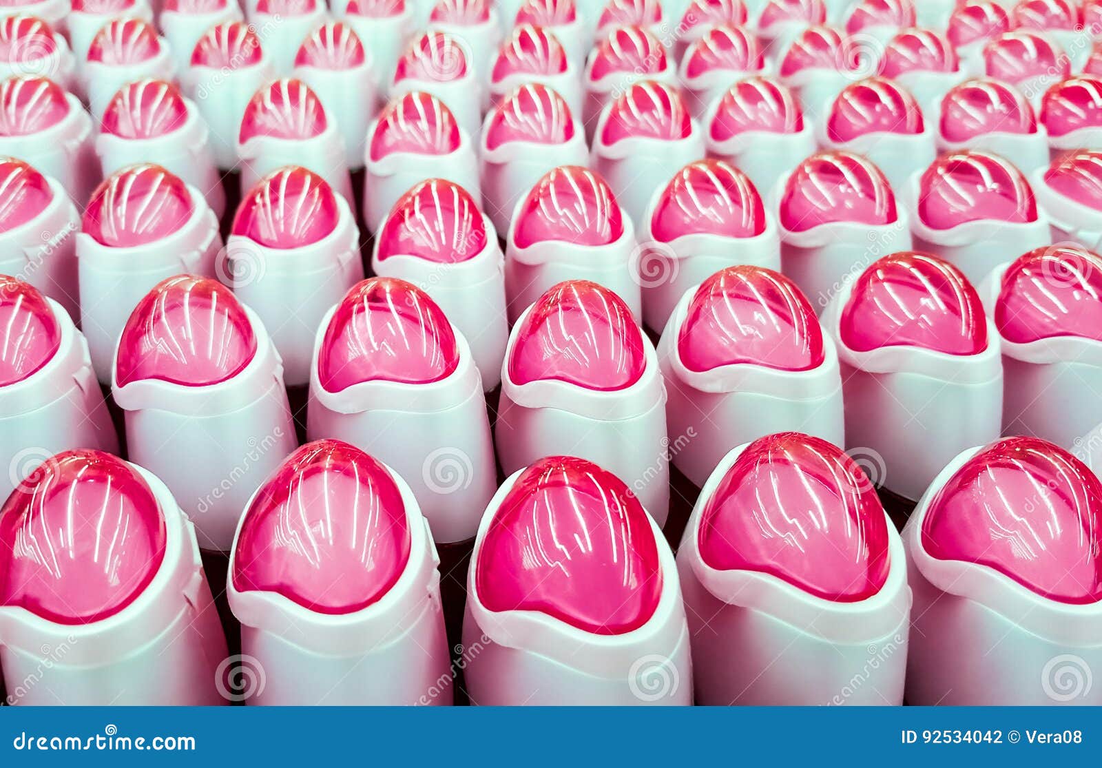 Deodorant, Bottles with Pink Lids in a Row. Stock Photo - Image of ...