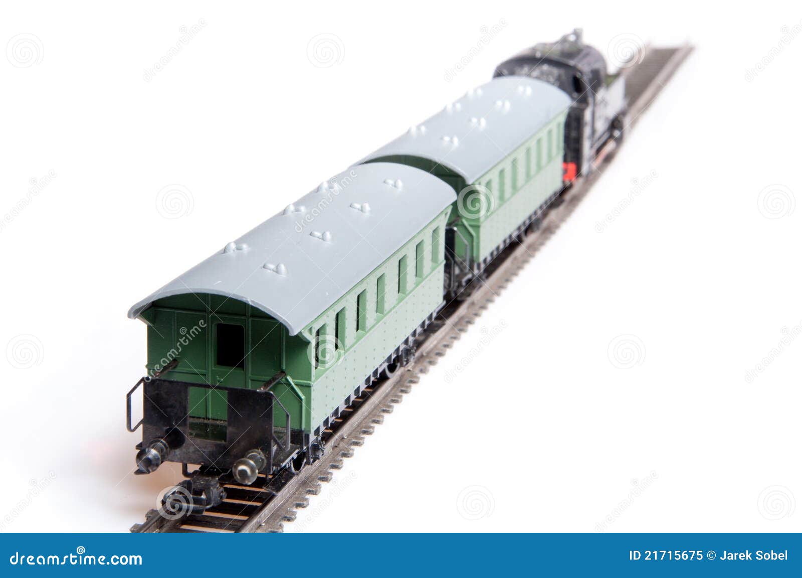 Departing Toy Steam Train Pulling Two Carriages Stock Image - Image of ...