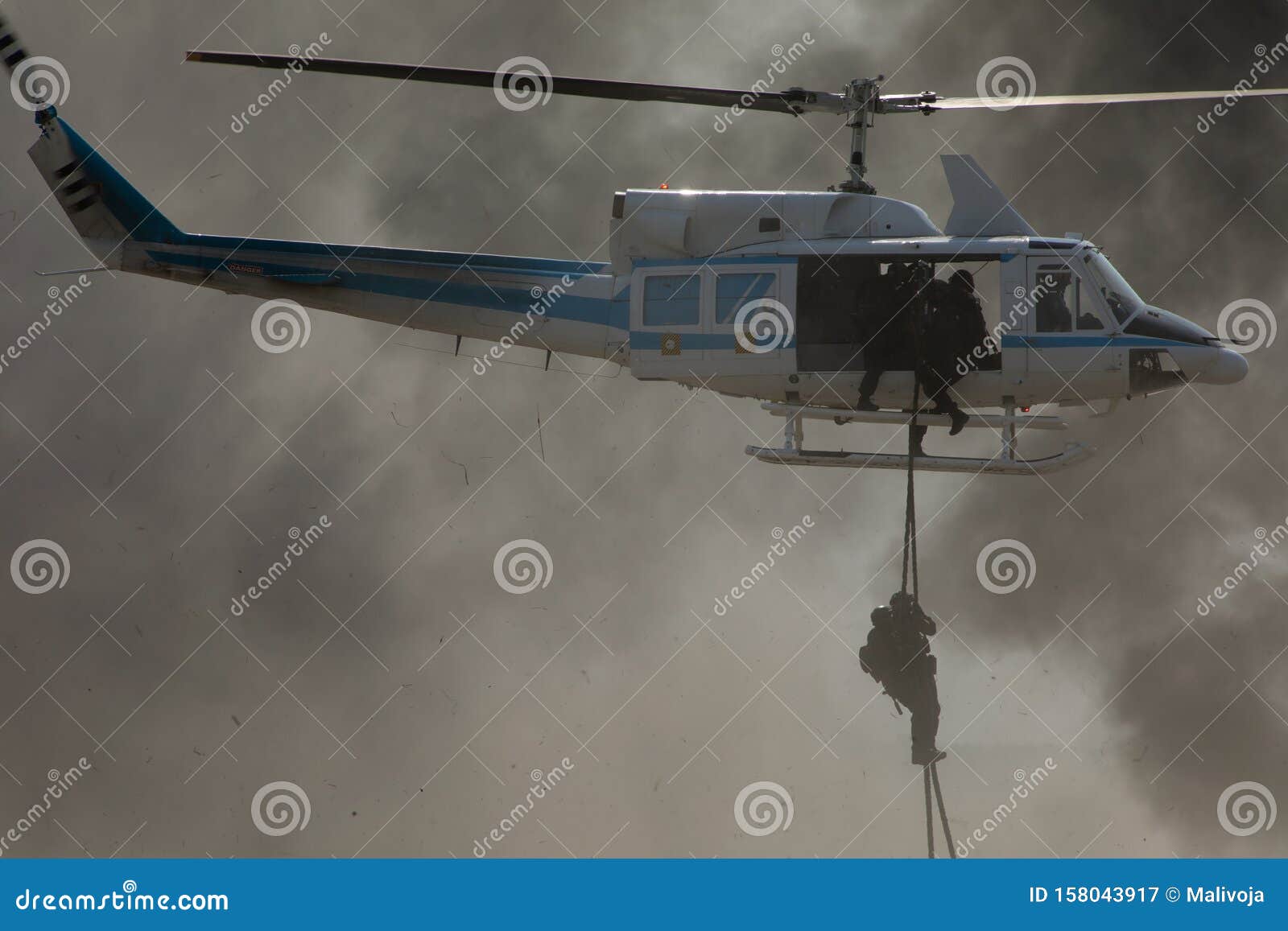 Deploying Troops from a Military Helicopter Using Fast-roping Technique ...