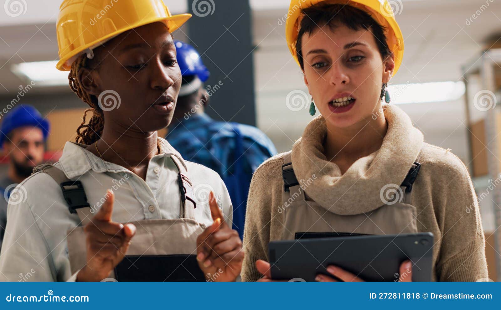 Depot Managers in Overalls Using Tablet for Inventory Stock Photo ...