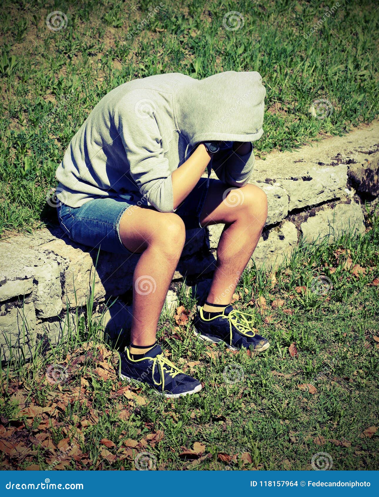 Depressed Boy while he Thinks with Vintage Effect Stock Photo - Image ...