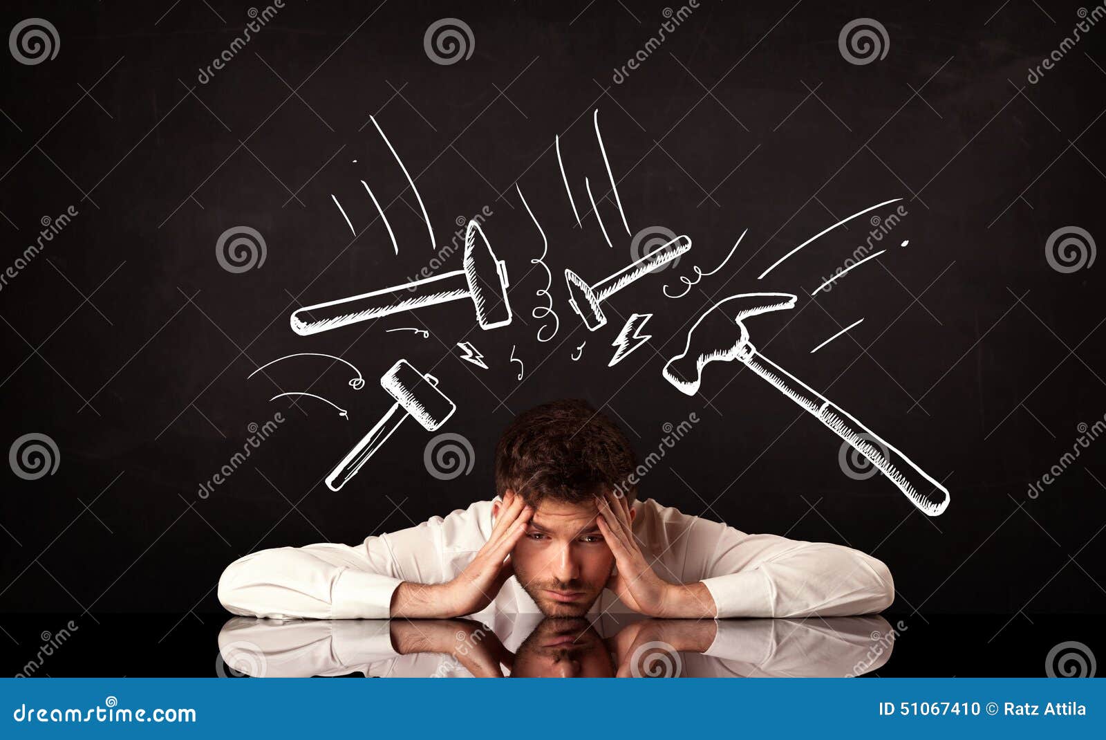 Depressed Businessman Sitting Under Hammer Marks Stock Photo - Image of ...