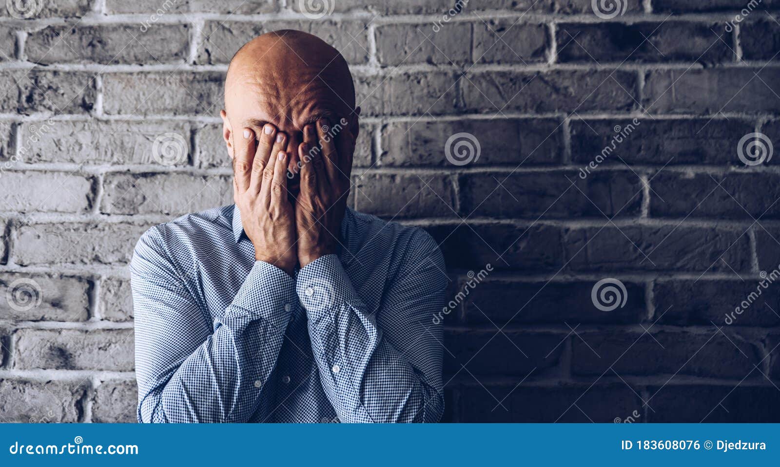 Crying Man in Front of the Grey Brick Wall during Finacial Crisis Stock ...