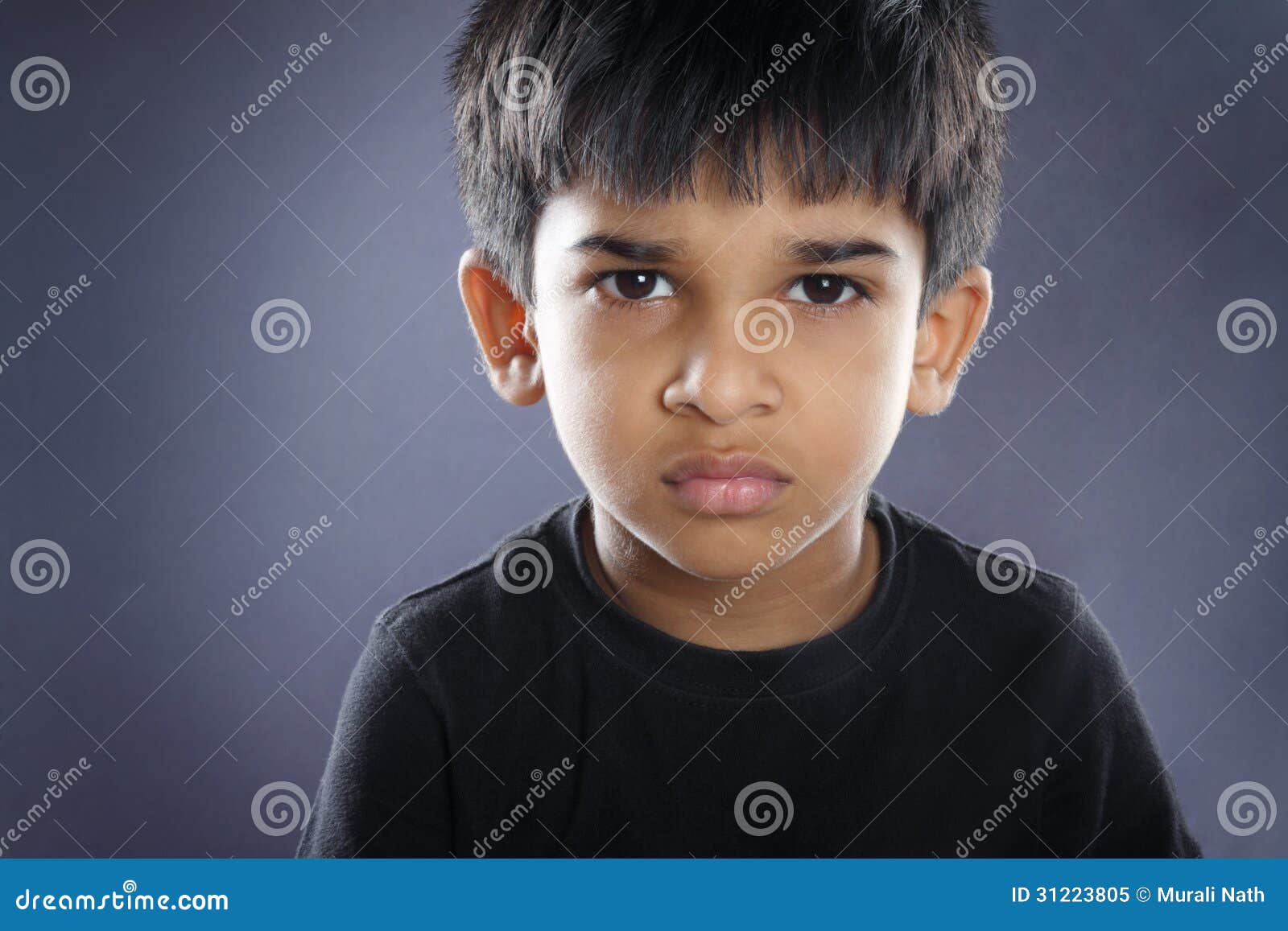 Depressed Indian Teen Girl Sitting On Floor At Home, Hugging Pillow ...