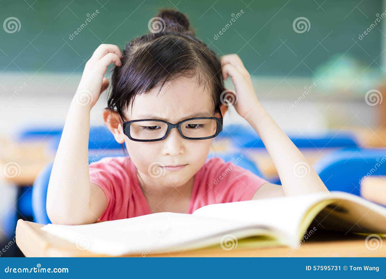 Depressed Little Girl Study in the Classroom Stock Image - Image of ...