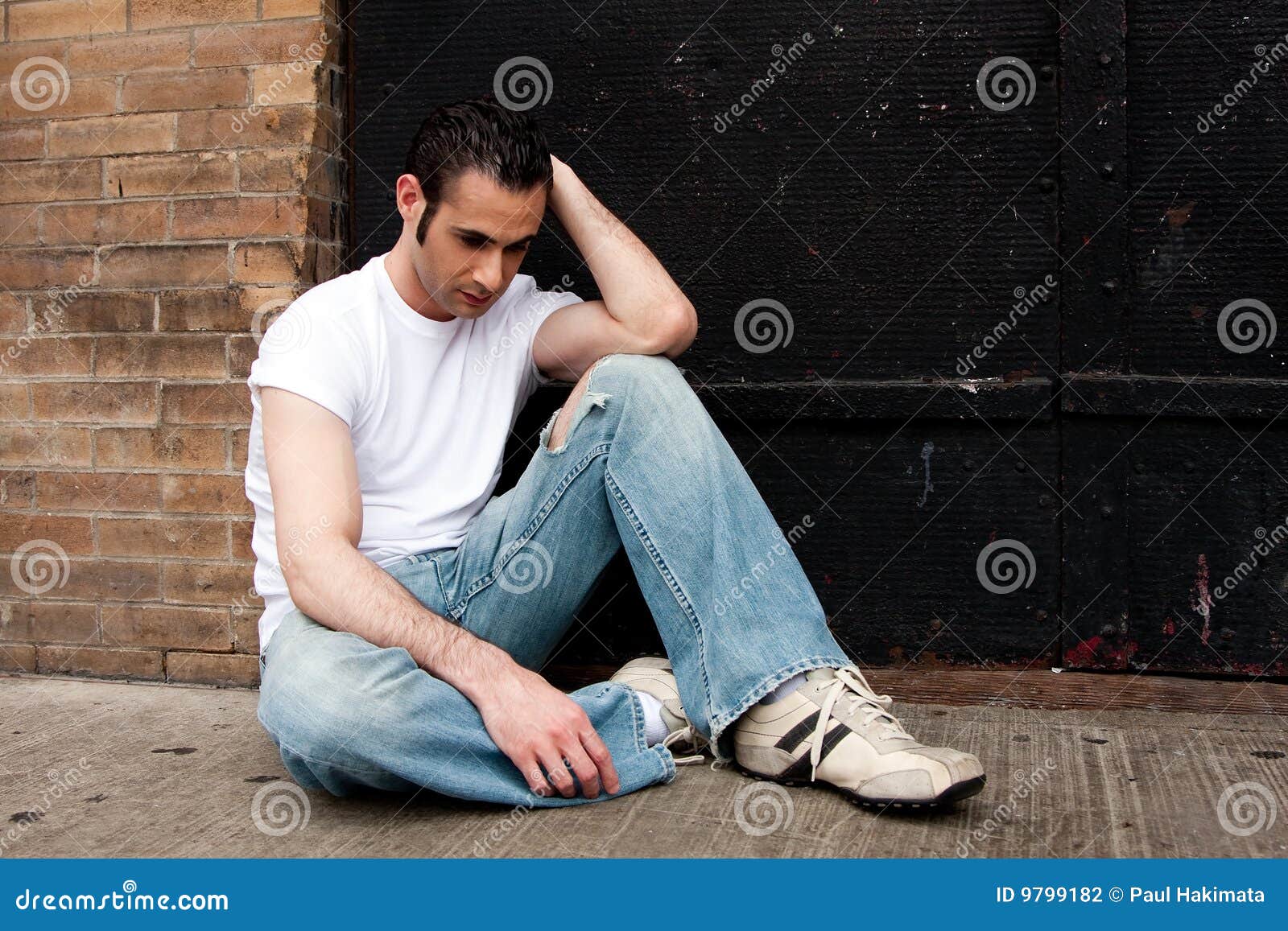 Depressed man stock photo. Image of garage, jeans, thought - 9799182