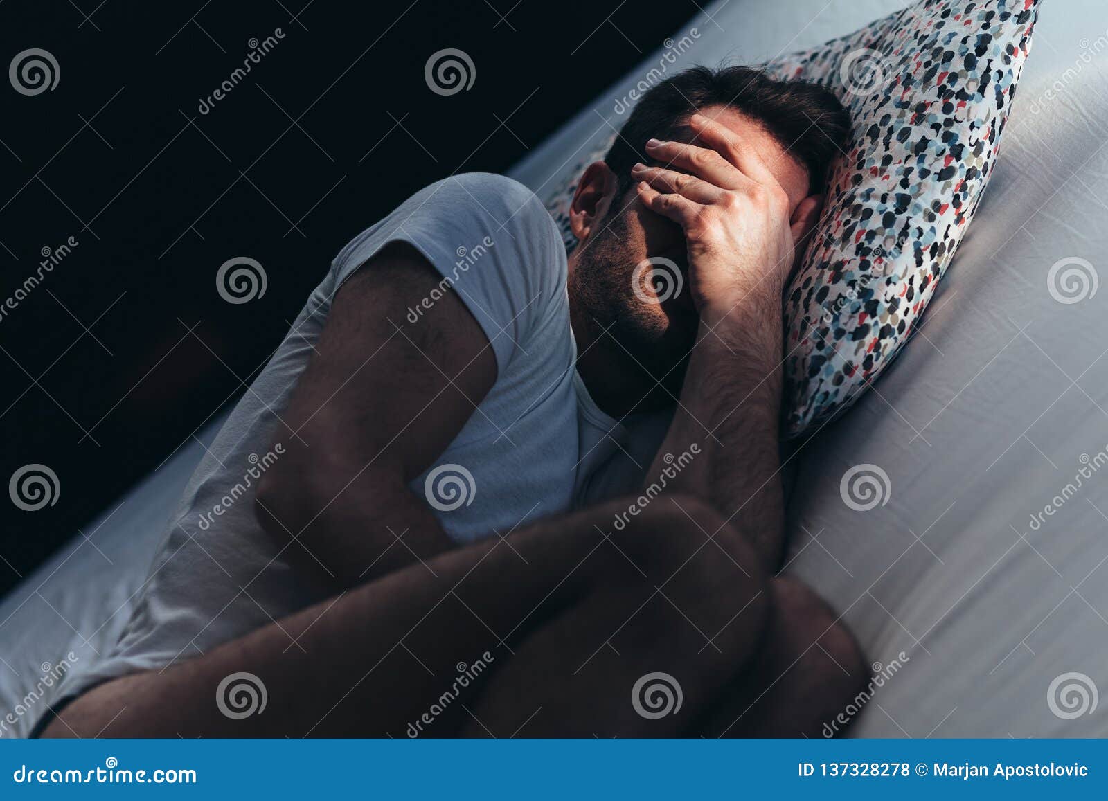 Depressed Man in Pain on the Bed Stock Photo - Image of bedroom ...