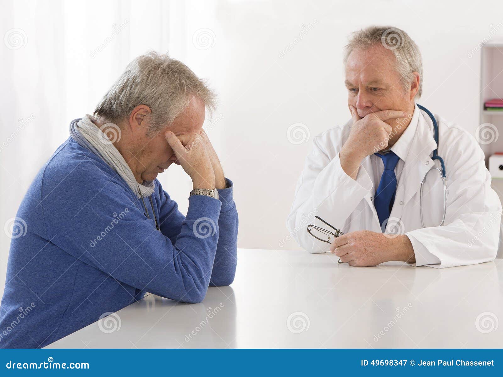 Depressed Man Visiting Doctor Stock Image - Image of listening ...