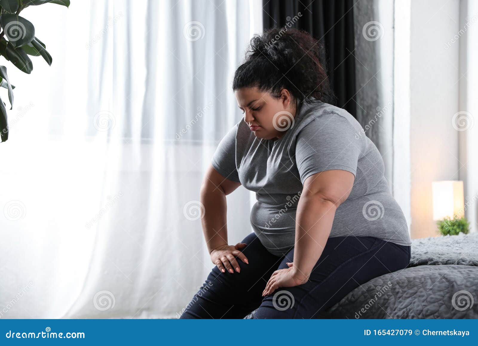 Depressed Overweight Woman on Bed Stock Image - Image of obese, disease ...