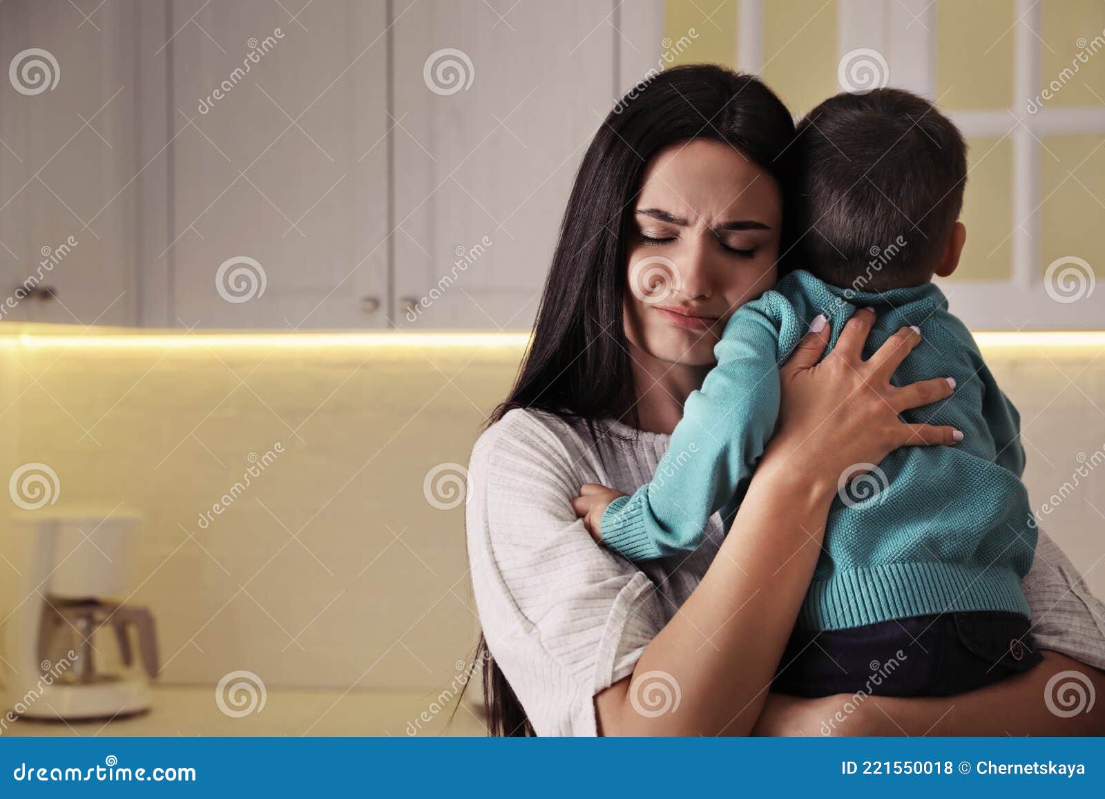 Depressed Single Mother with Child in Kitchen Stock Photo - Image of ...
