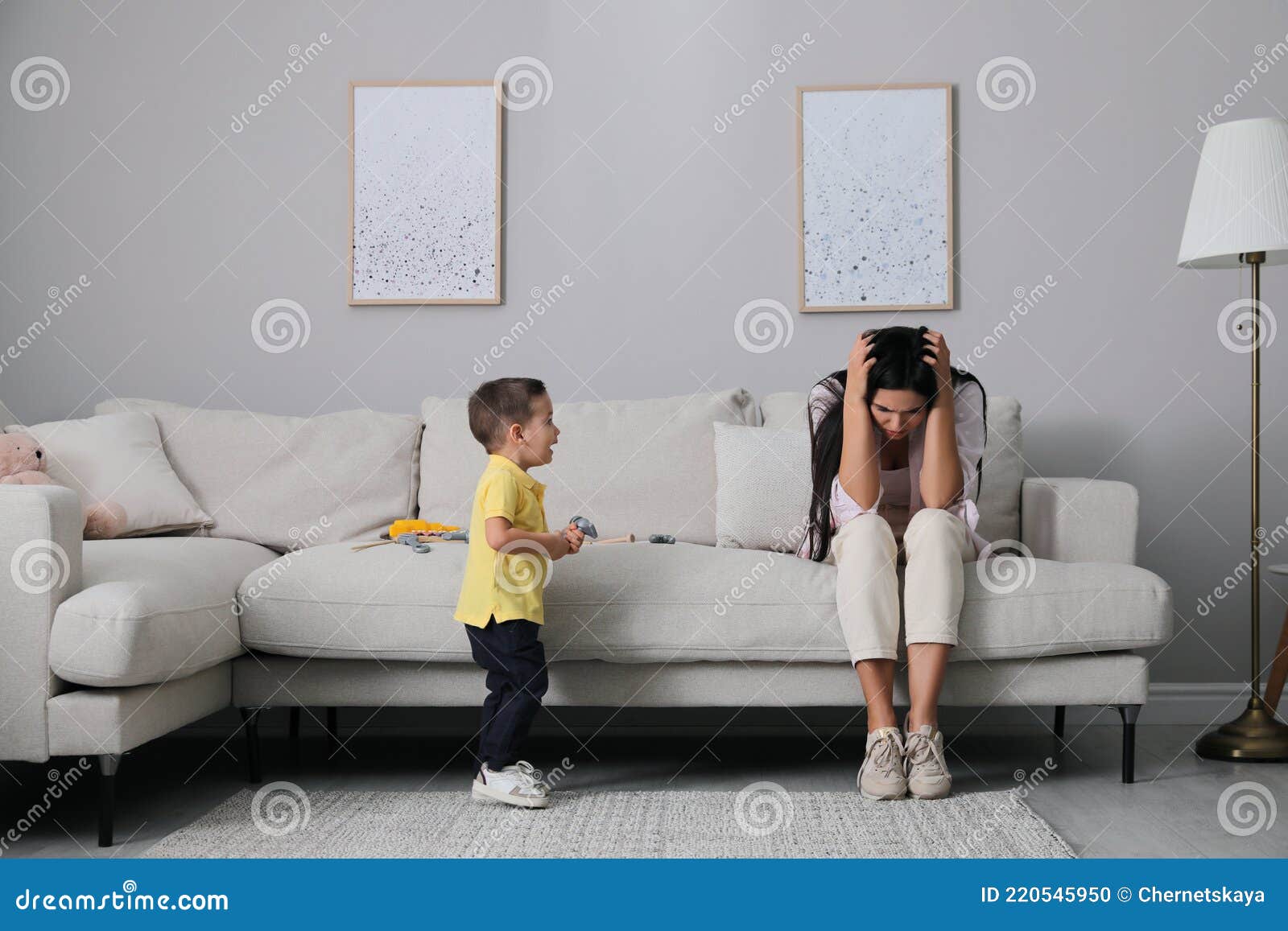 Depressed Single Mother with Child in Room Stock Photo - Image of baby ...