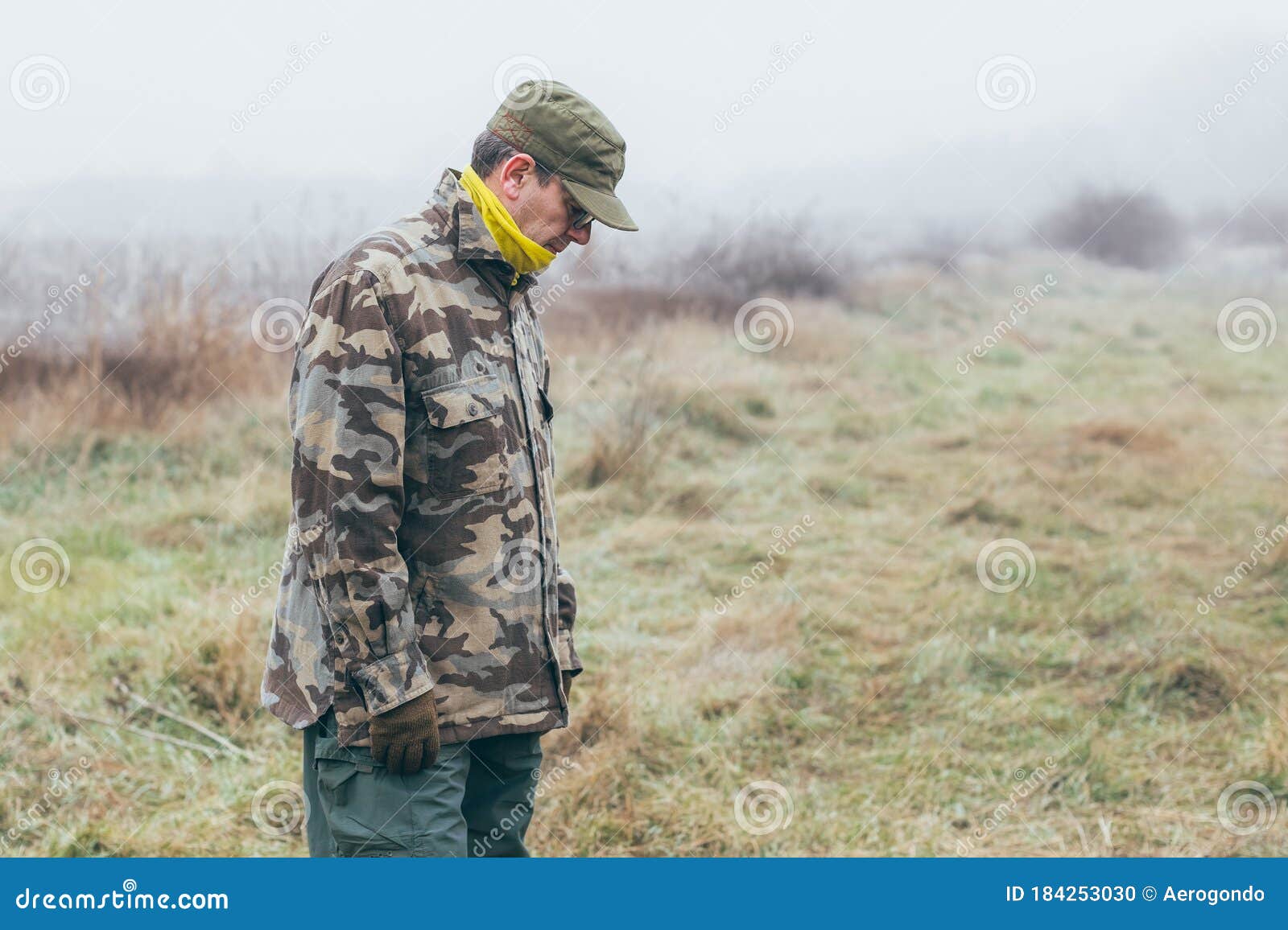 Depressed Soldier at the Field Looking Down Stock Photo - Image of haze ...