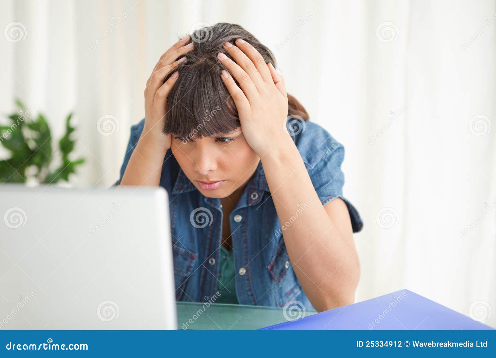 Depressed Student Looking at Her Computer Stock Photo - Image of ...