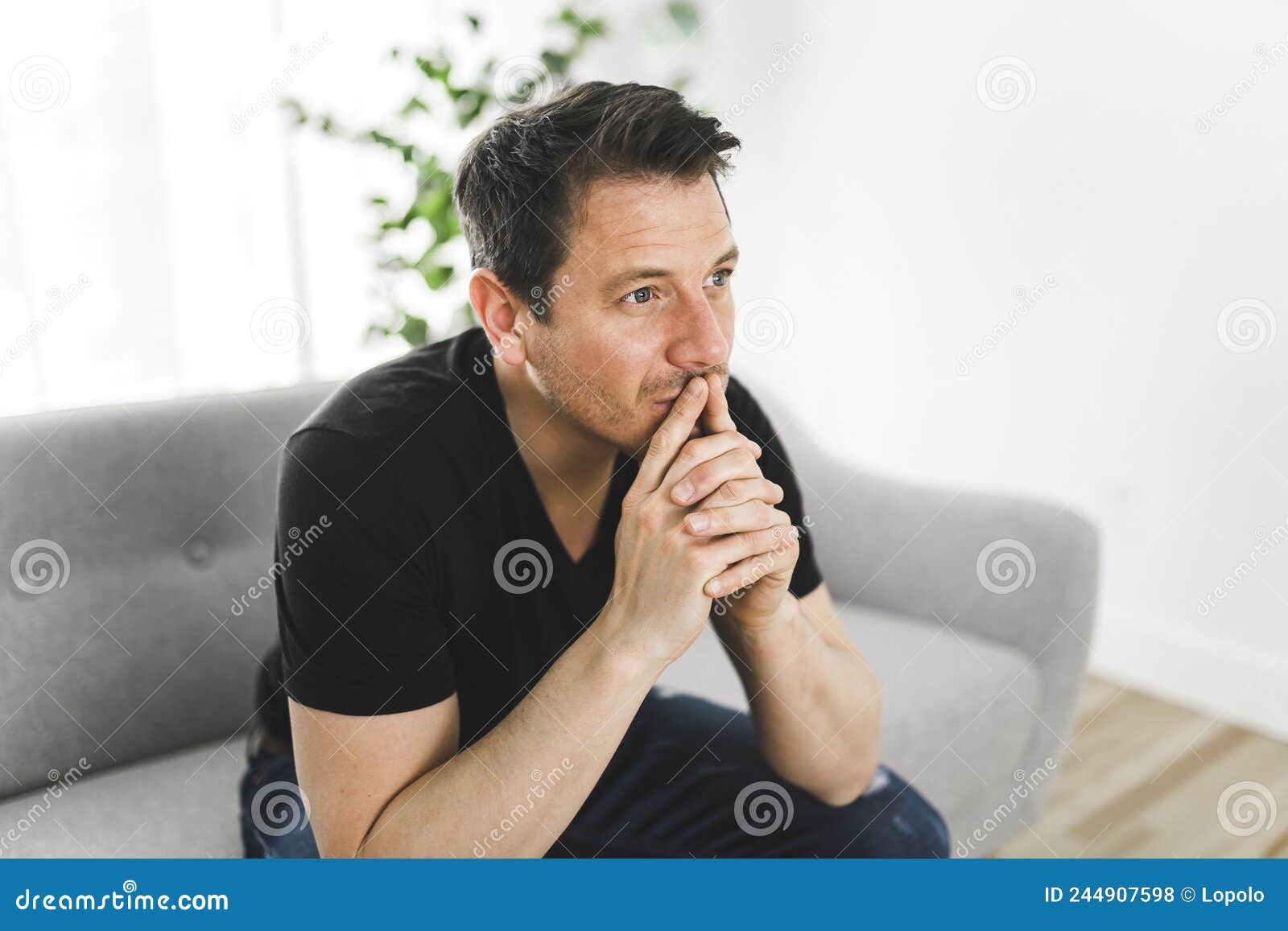 Depressed and Thinking Man Thinking at Home on Couch Stock Photo ...
