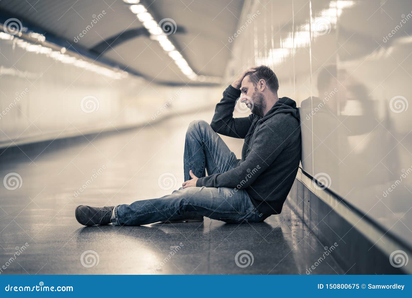 Depressed Young Man Looking Overwhelmed and Sad Suffering from D Stock ... Depressed Young Man Looking Overwhelmed and Sad Suffering from D Stock ...