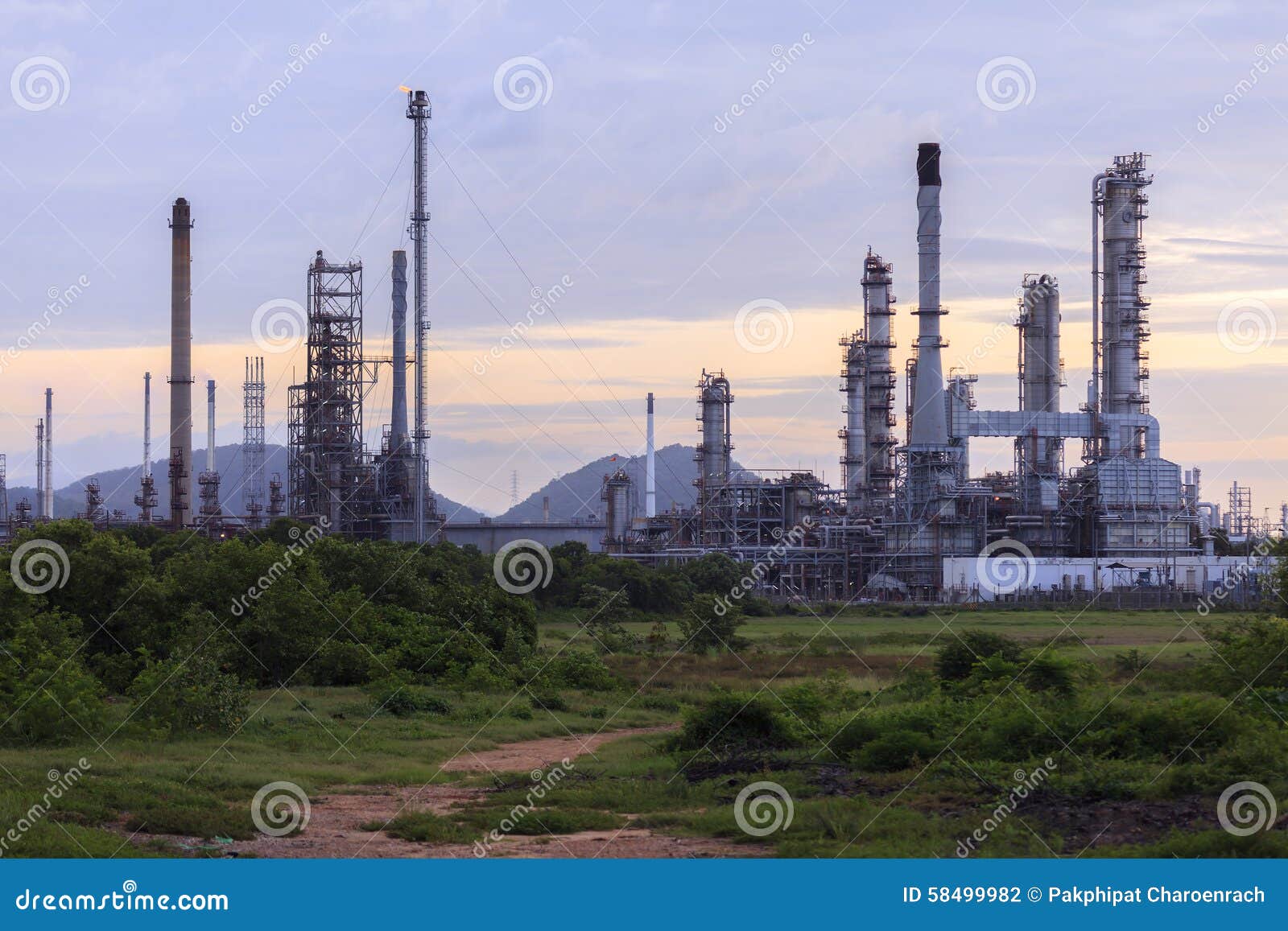 Depth of Field the Oil Refinery with Steam at Sunrise Time. Stock Photo ...