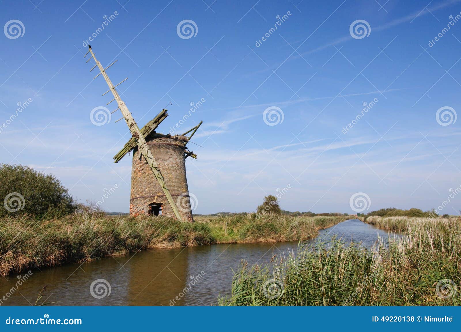 Drainage Windmill With Thatched Roofing In A Polder With Dramatic ...