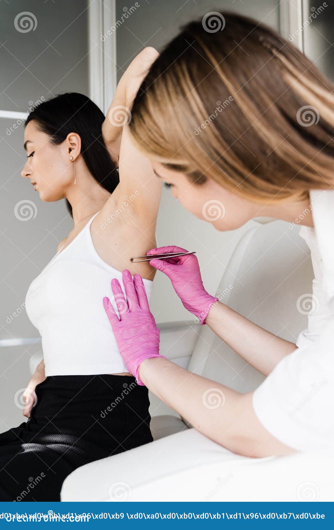 Dermatologist Examines Moles Or Birthmark Of Girl Patient For Revention