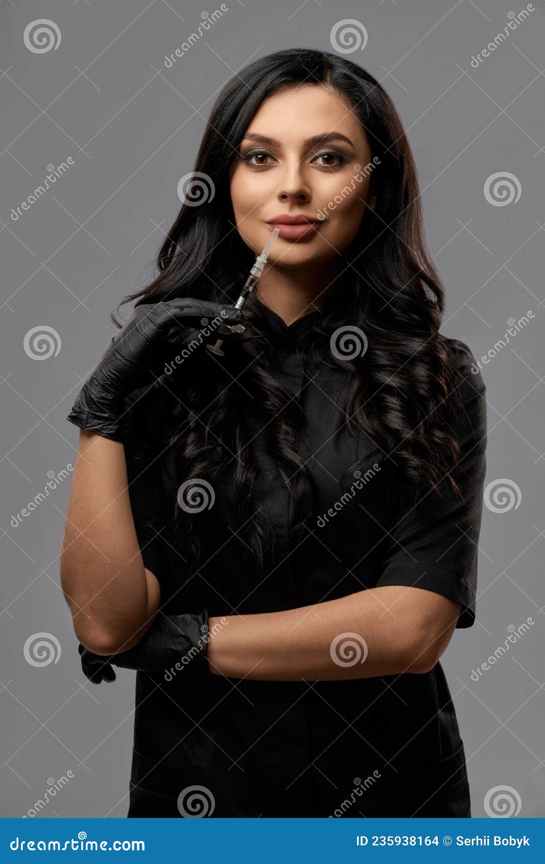 Dermatologist in Uniform Standing in Studio with Syringe Stock Photo ...