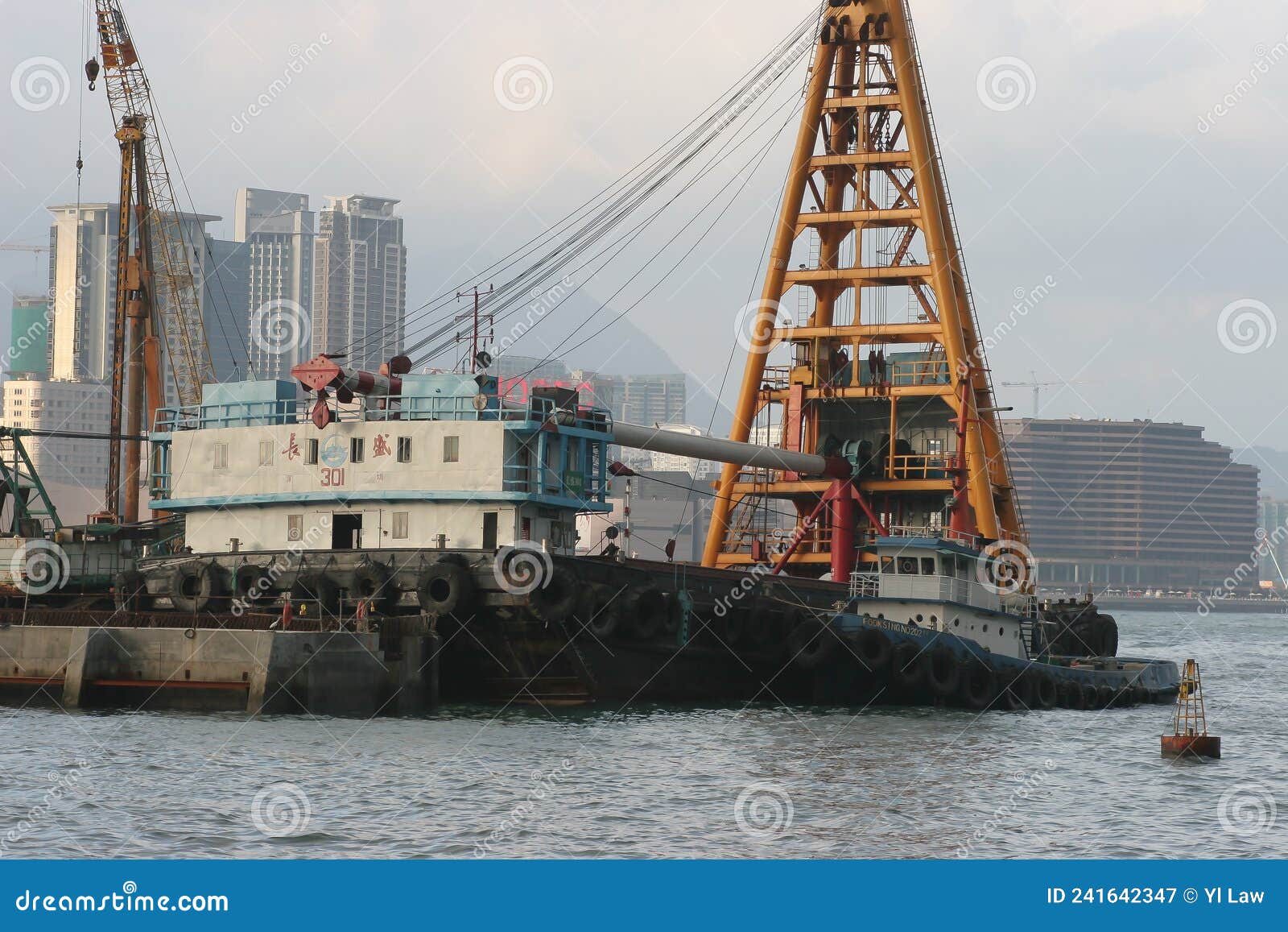A Derrick Ship in the Hong Kong Harbor. 15 May 2005 Editorial ...