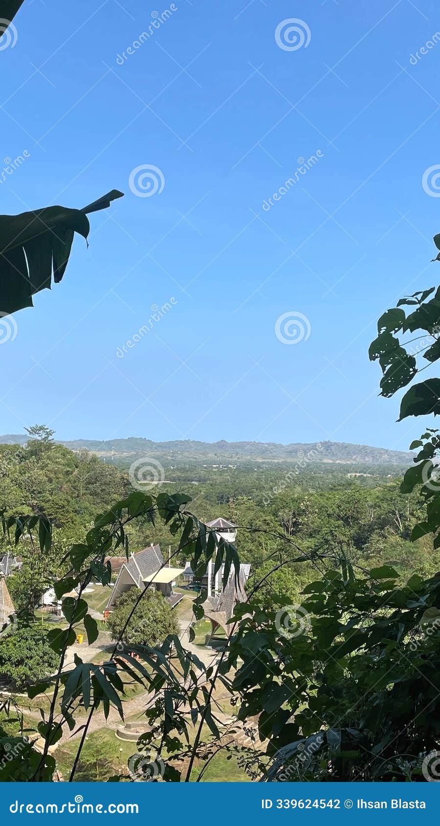Photo of Mountain Scenery from a Distance Stock Photo - Image of statue ...