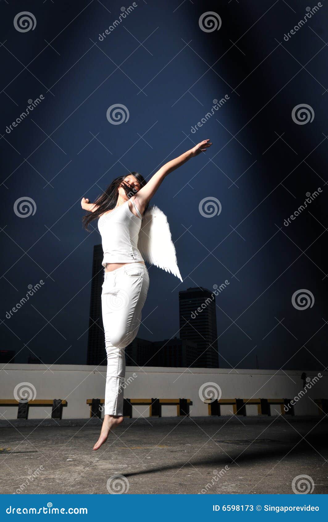 Descending Asian Angel from the Sky Above Stock Image - Image of glare ...