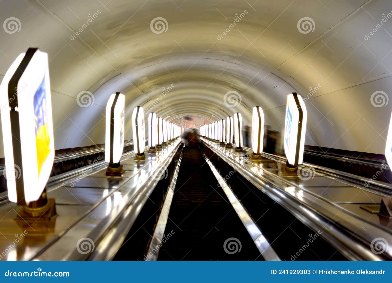 The Descent on the Escalator in the Underground Metro.Toning Stock ...