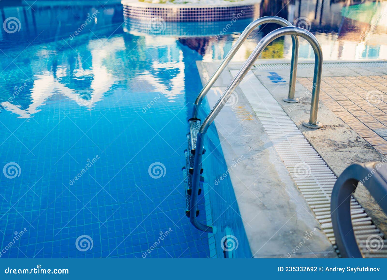 Descent into the Pool. Villas are Reflected in the Water Stock Photo ...