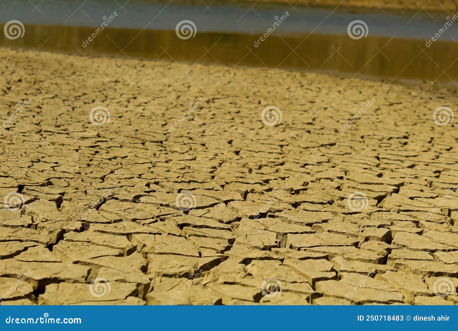 Desert Against the Ground with Cracks with Water Level Down Stock Image ...