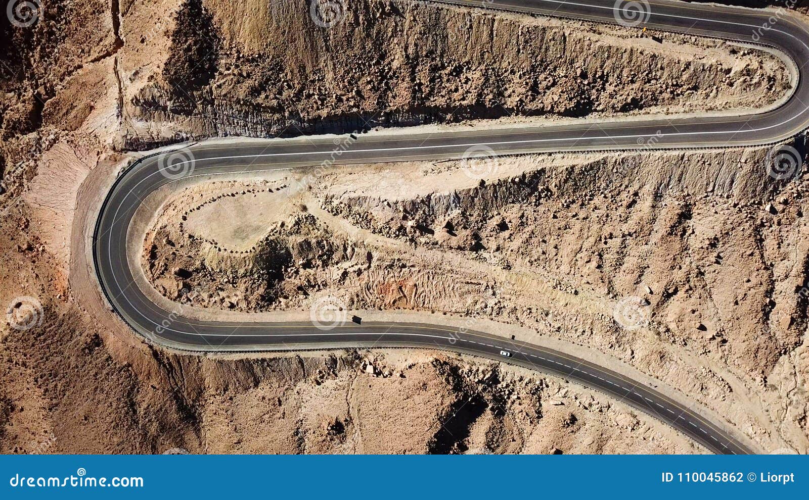 Desert Road - Aerial Image of Traffic Going Up and Down Stock Photo ...