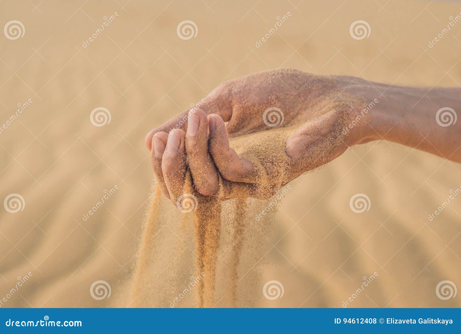 Desert, Sand Puffs through the Fingers of a Man S Hand Stock Photo ...