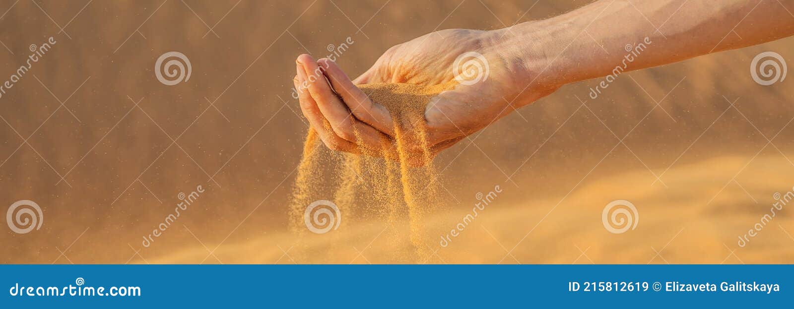 Desert, Sand Puffs through the Fingers of a Mans Hand BANNER, LONG ...
