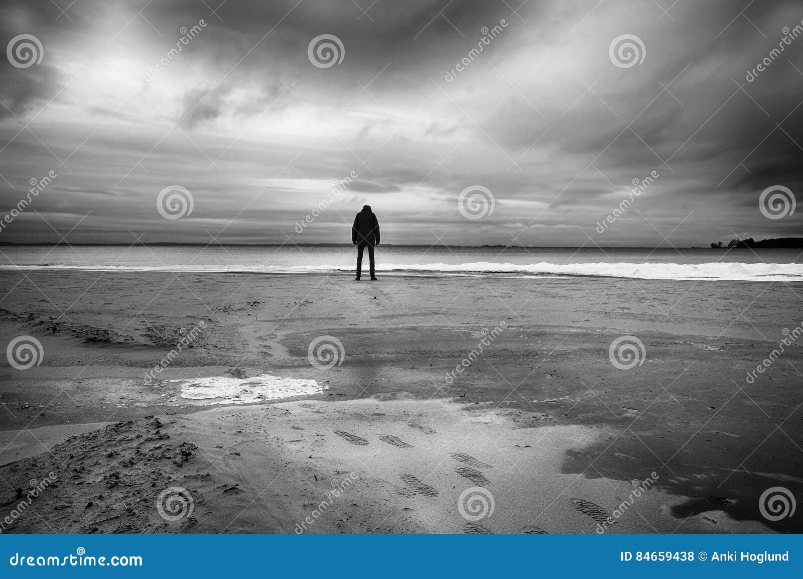 Deserted beach in winter stock photo. Image of black - 84659438