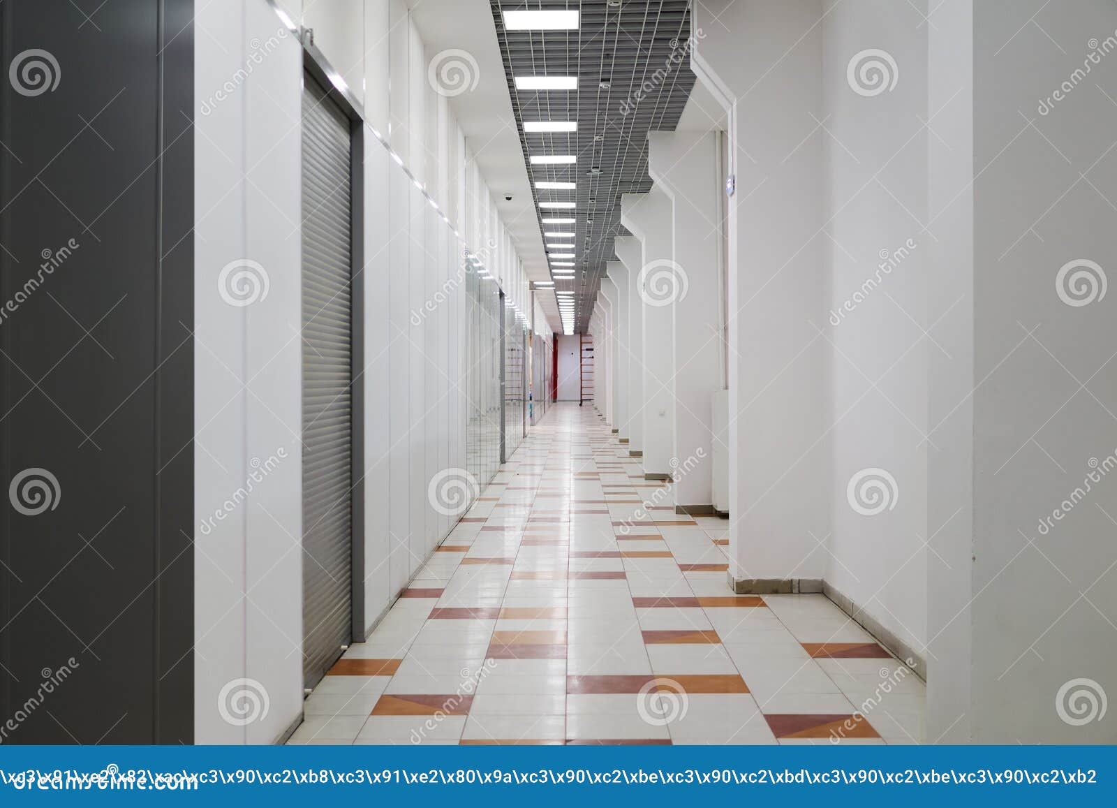 Deserted Mall Corridor with Closed Retail Space Stock Image - Image of ...