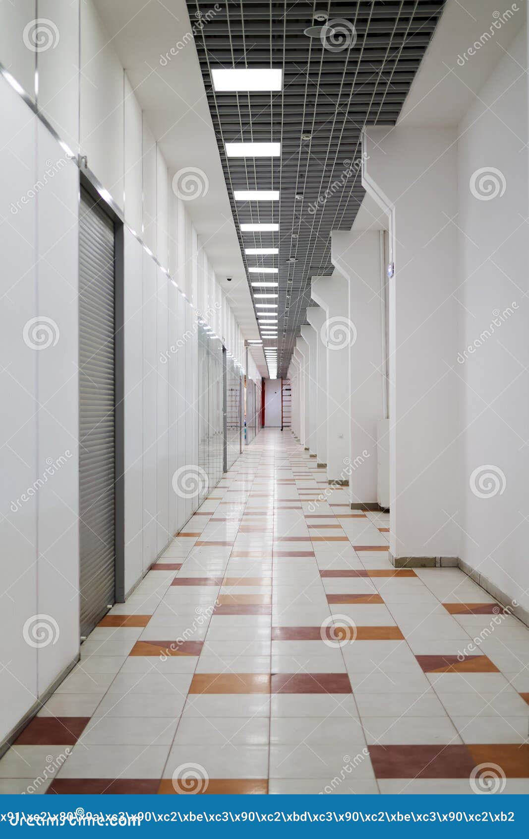 Deserted Mall Corridor with Closed Retail Space, Vertical Frame Stock ...