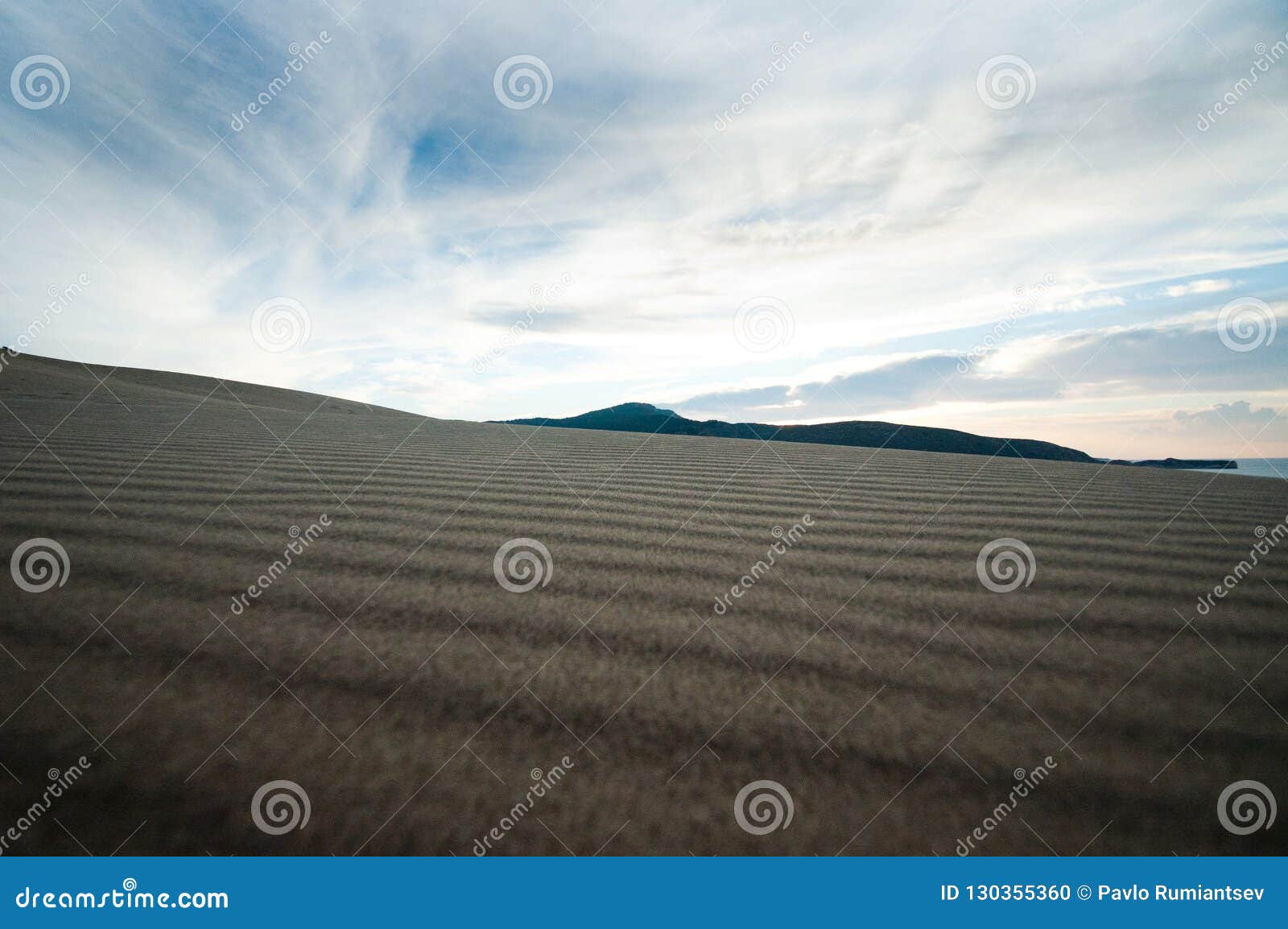 Deserted Sandy Beach with Clean Fine Sand at Sunrise Stock Photo ...