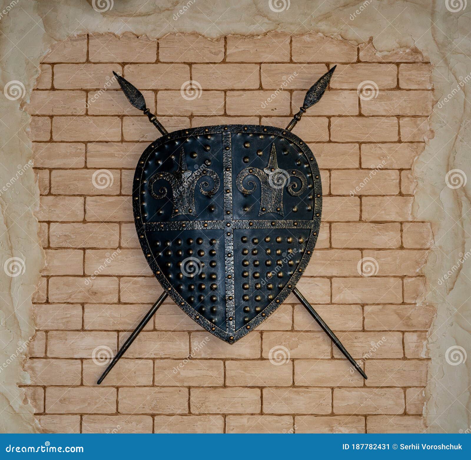 Design of an Ancient Castle. Brick Wall. Shield and Spears on the Wall ...