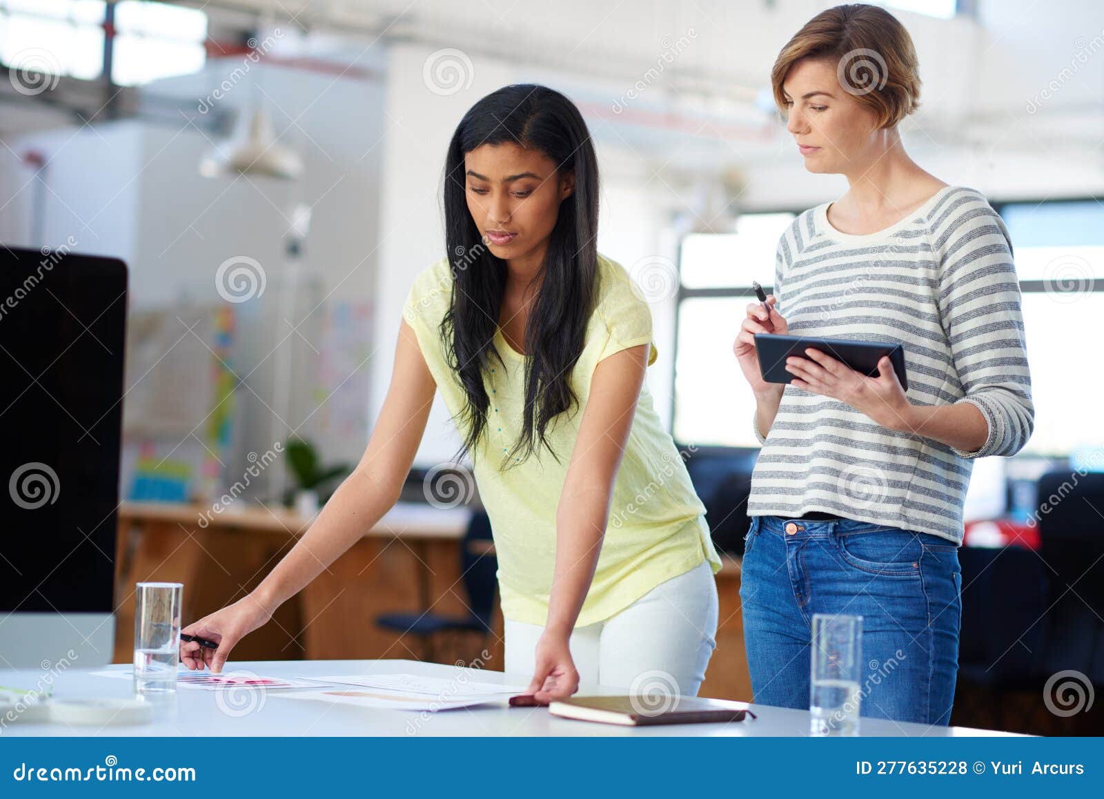 Design is in the Details. Two Colleagues Having a Brainstorming Meeting ...