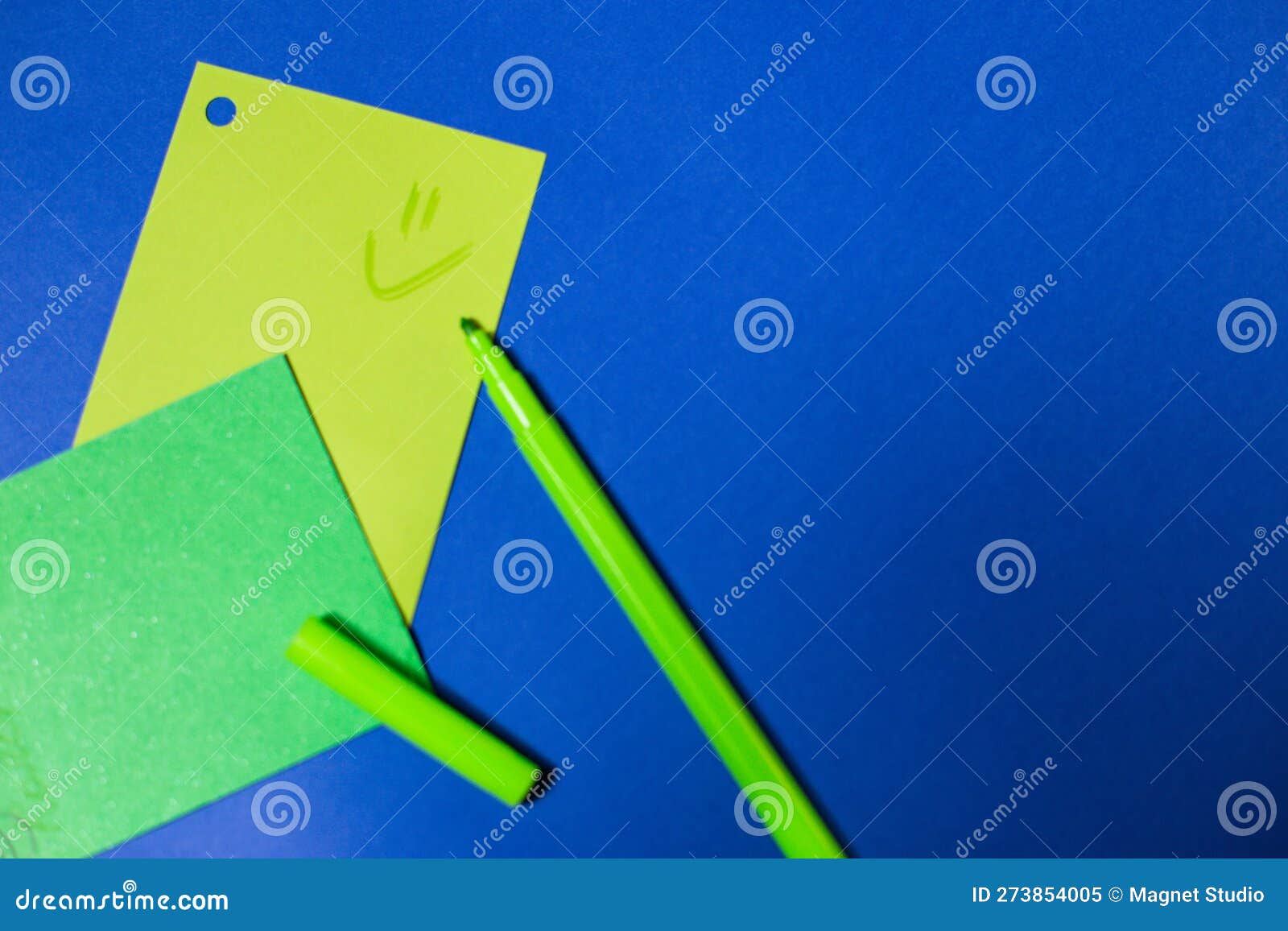 Design Paper, Shades of Green, on a Blue Table with a Dark Background ...