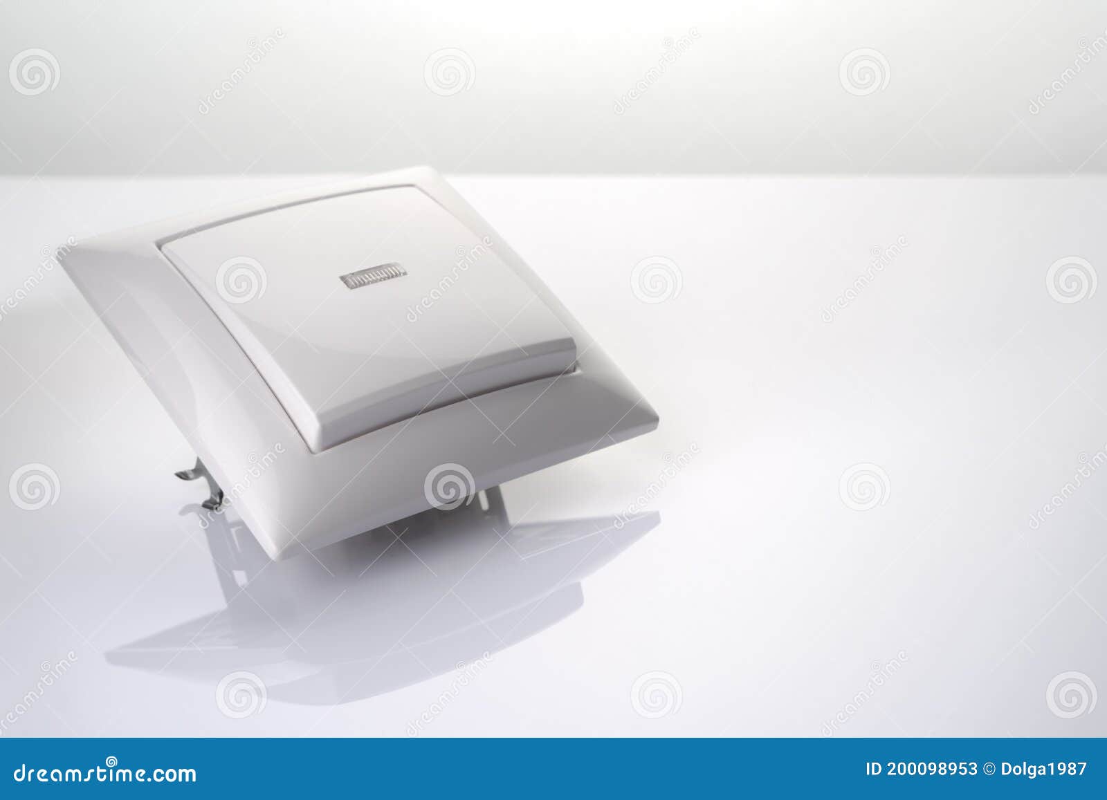 The Design of Square Light Switch on the Glossy Table. Stock Image ...