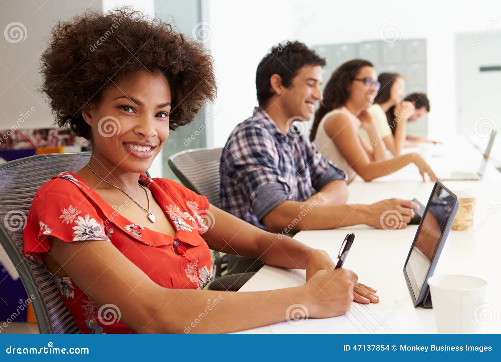 Design Team Collaborating on Project Together Stock Photo - Image of ...