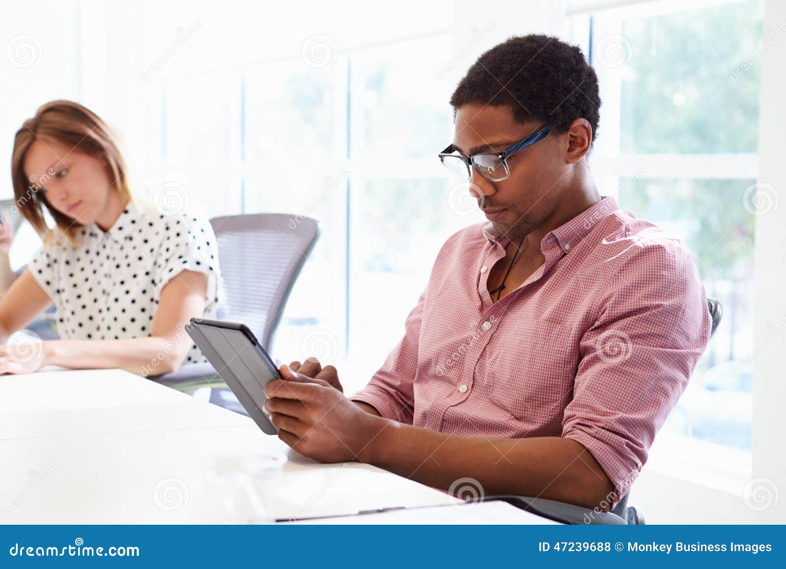 Design Team Collaborating on Project Together Stock Photo - Image of ...