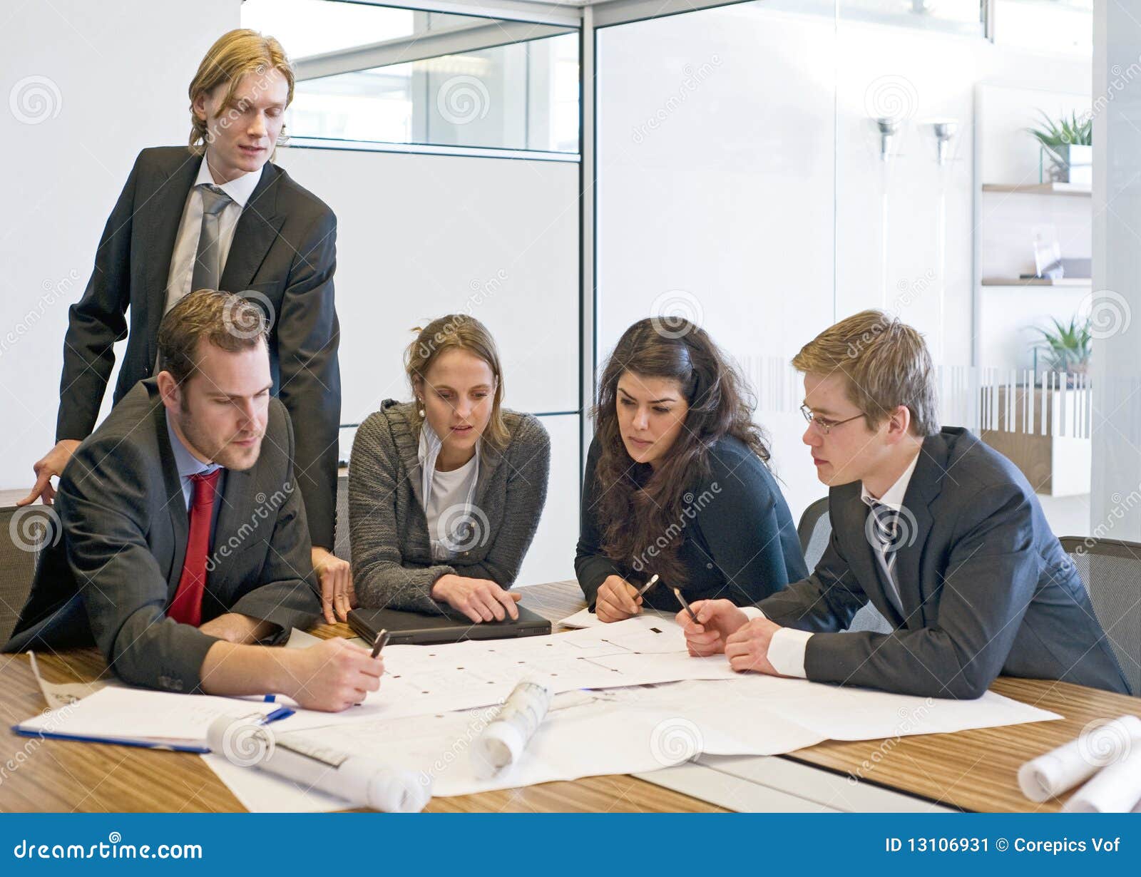 Design team meeting stock image. Image of businessmen - 13106931