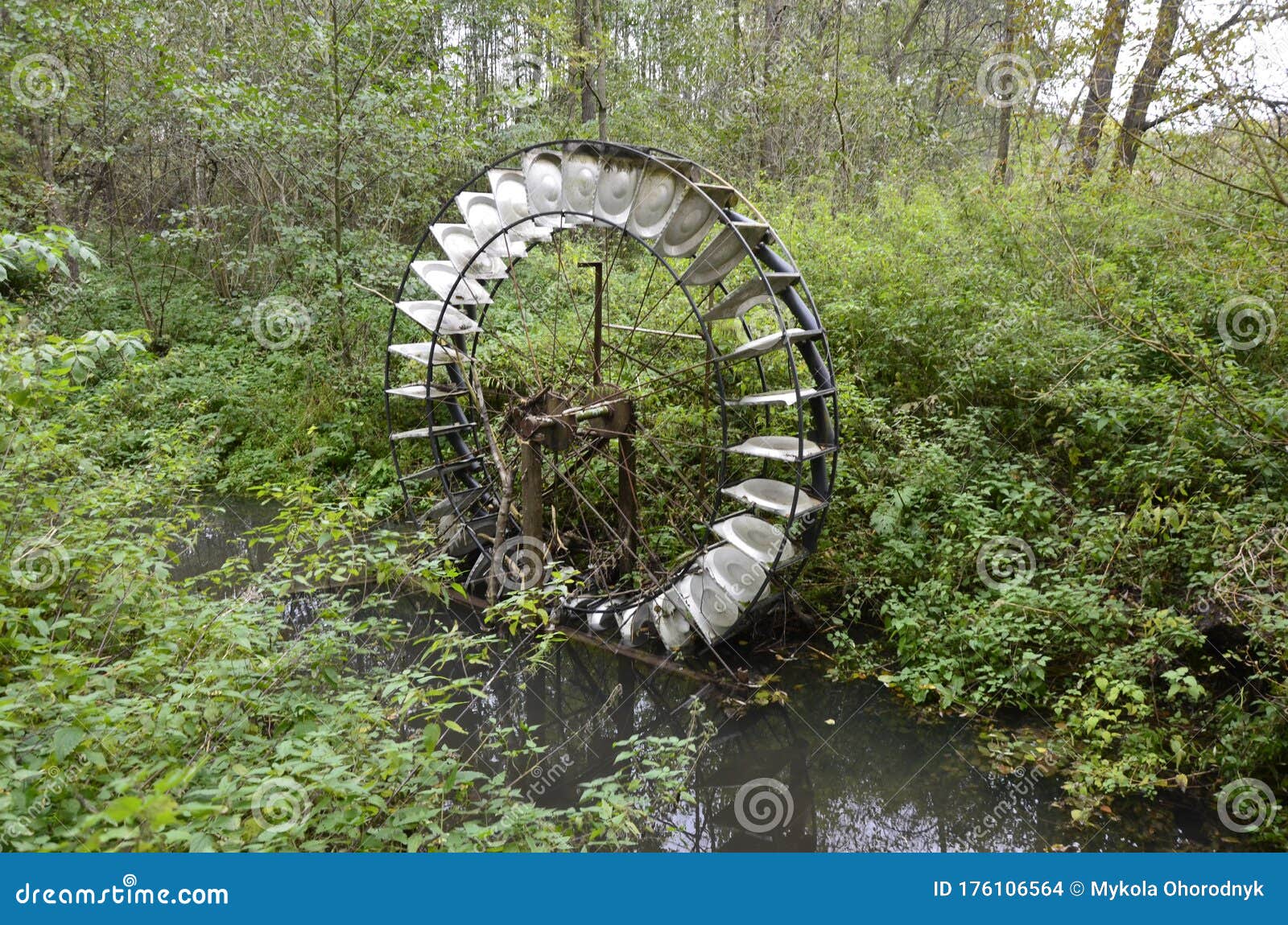Design of Water Wheel with Blades for Water Pumping Stock Photo - Image ...