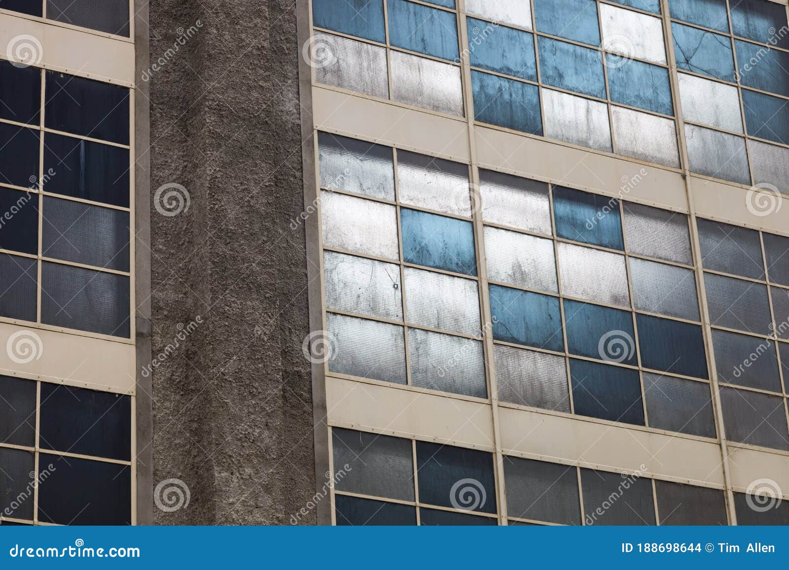 Designed Factory Window with Styled Blue & White Glass Squares Stock ...