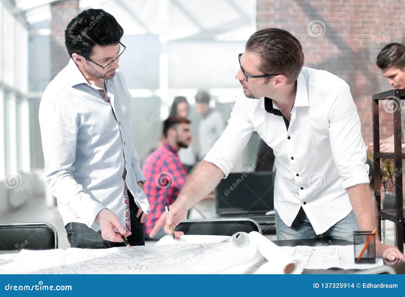 Designer and Architect Discussing Ideas for a New Project Stock Photo ...