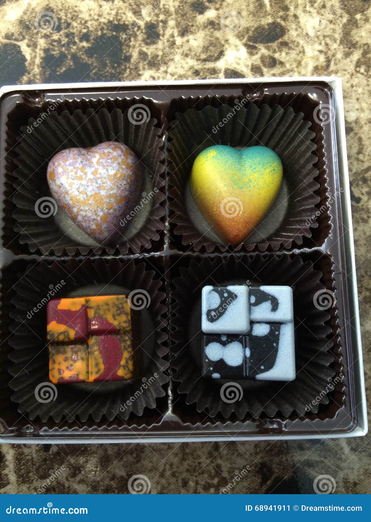 Designer chocolates stock image. Image of dressed, designer - 68941911